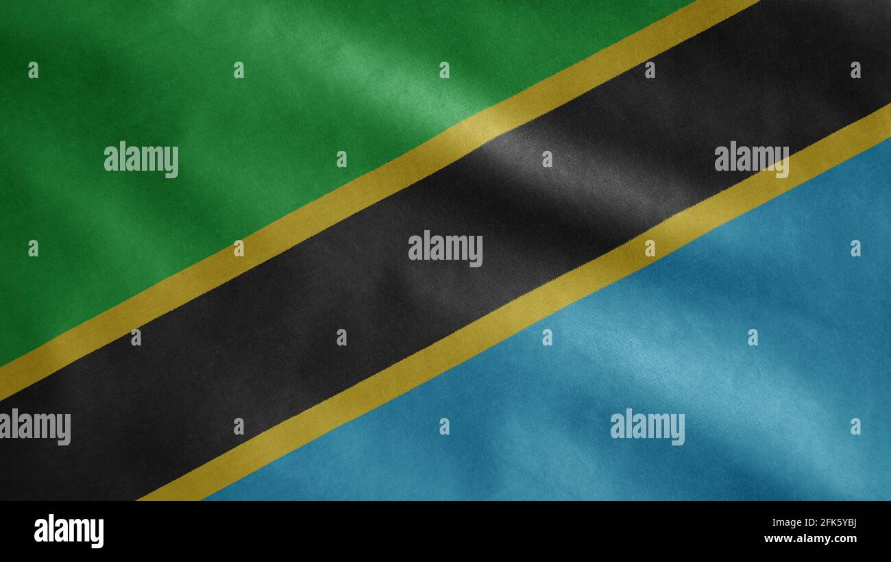 Tanzanian flag waving in the wind. Close up of Tanzania banner blowing ...