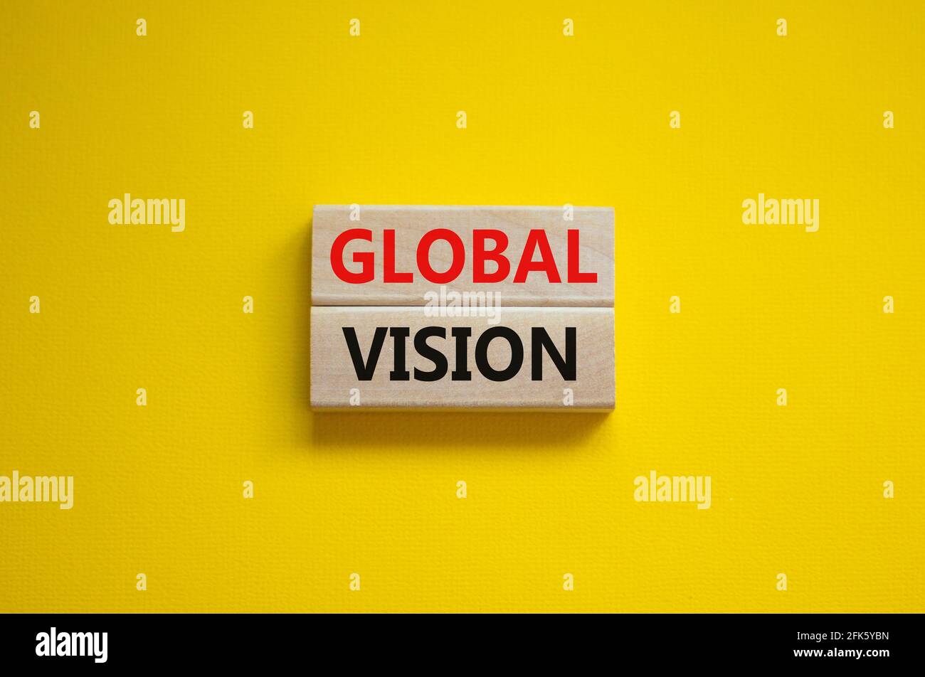 Global vision symbol. Wooden blocks with words 'Global vision' on ...
