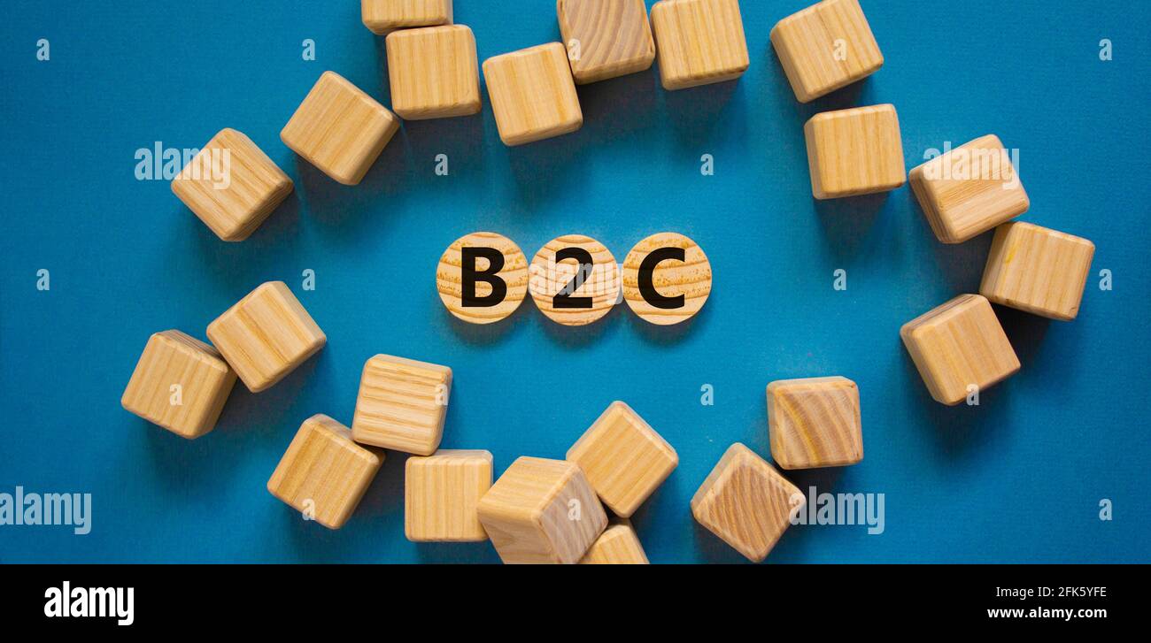 B2C, business to customer symbol. Wooden circles with word 'B2C ...