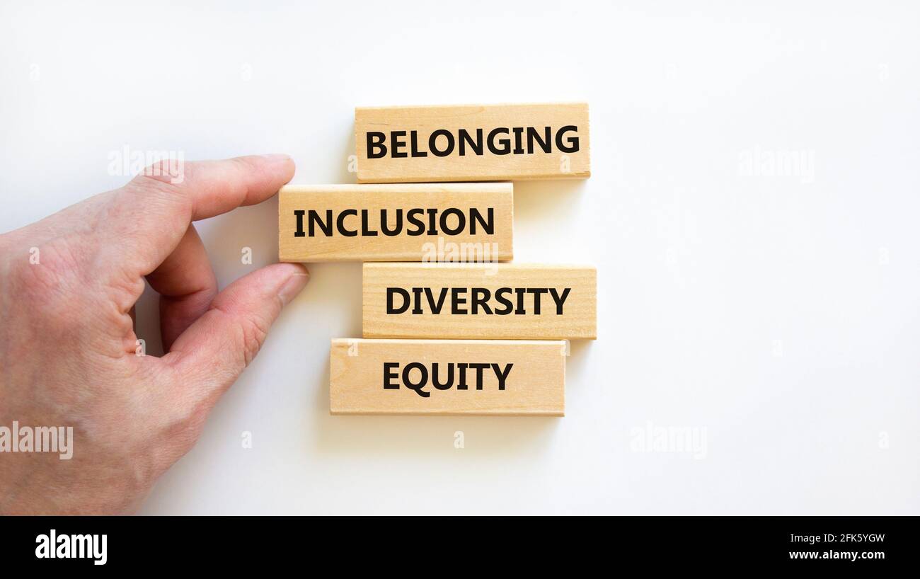 Equity, diversity, inclusion and belonging symbol. Wooden blocks with ...