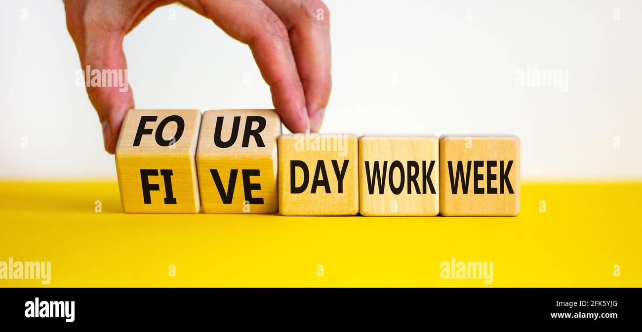 4 or 5 day work week symbol. Businessman turns cubes, changes words ...