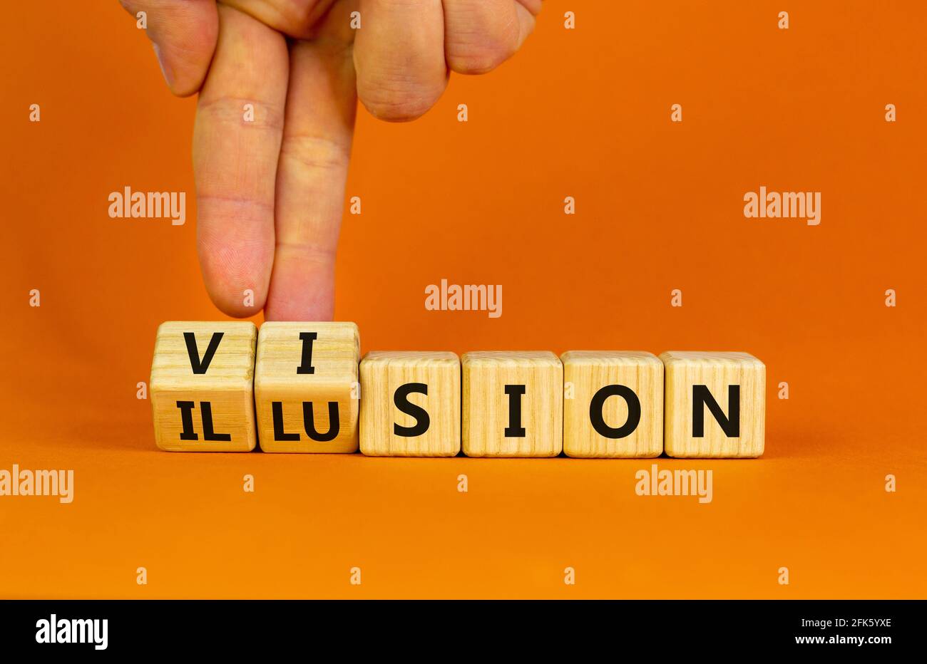Vision or illusion symbol. Businessman turns wooden cubes and changes ...