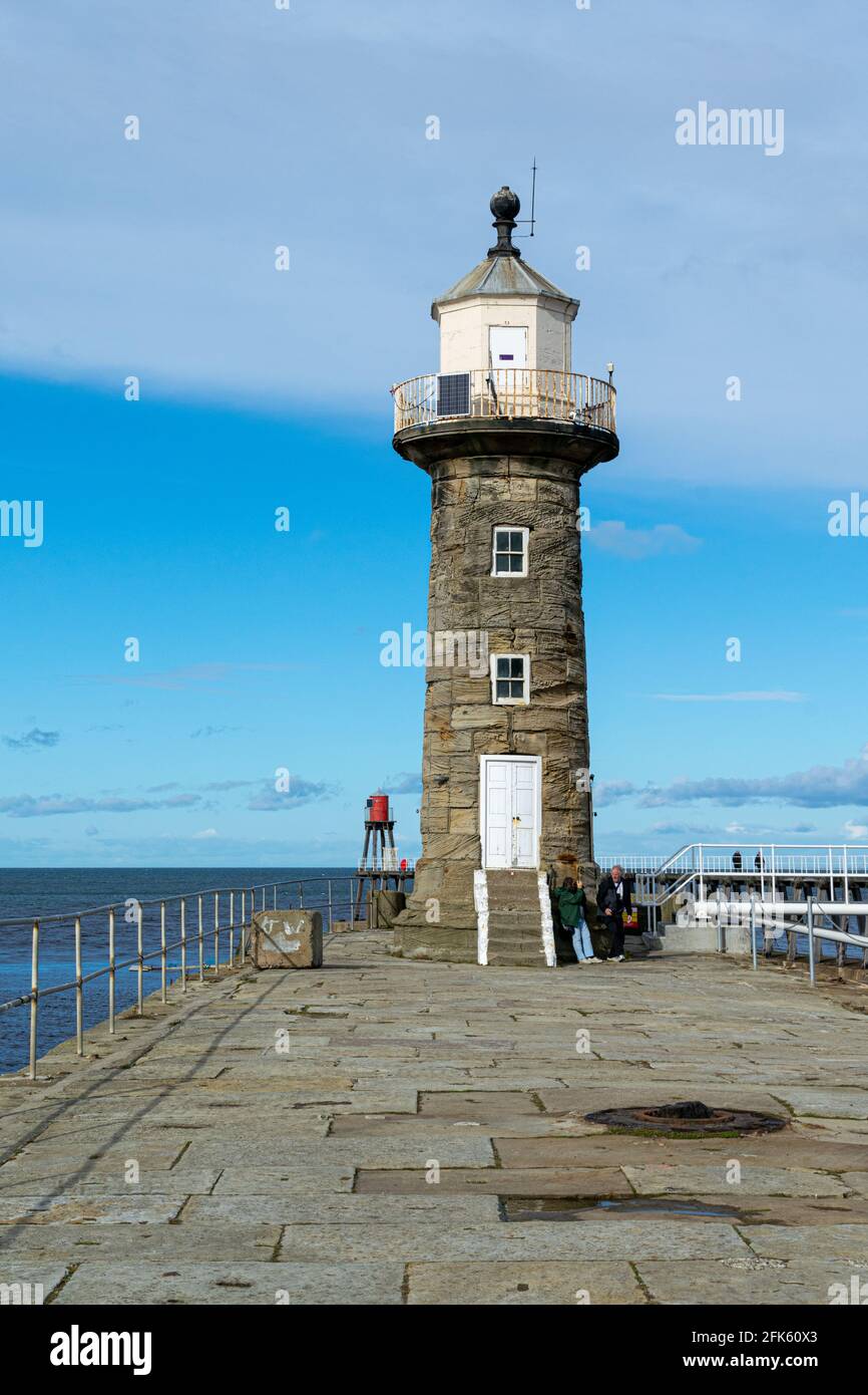 Whitby, Yorkshire, England - October 2020: The tower of the East Pier ...
