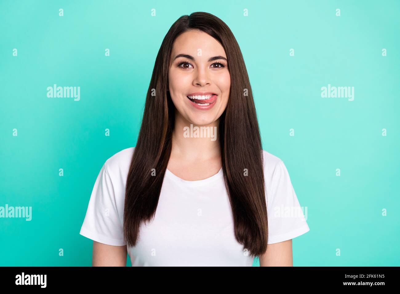 Photo of young attractive woman happy positive smile tongue lick teeth ...