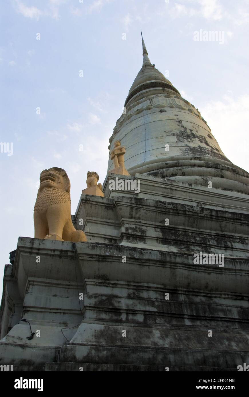 Lion statues at the main Stupa at Wat Phnom, Phnom Penh, Cambodia Stock ...