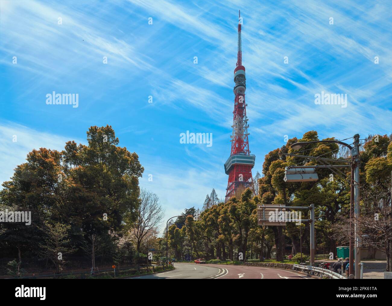 tokyo, japan - april 06 2021: Hakusan iwaida tamachi street lined by trees leading to the ...