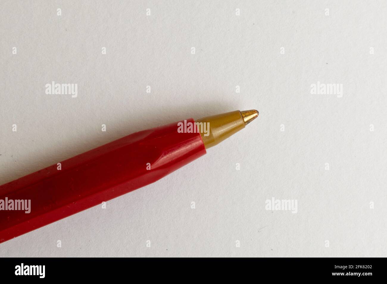 Red pen tips on white background macro photography Stock Photo - Alamy