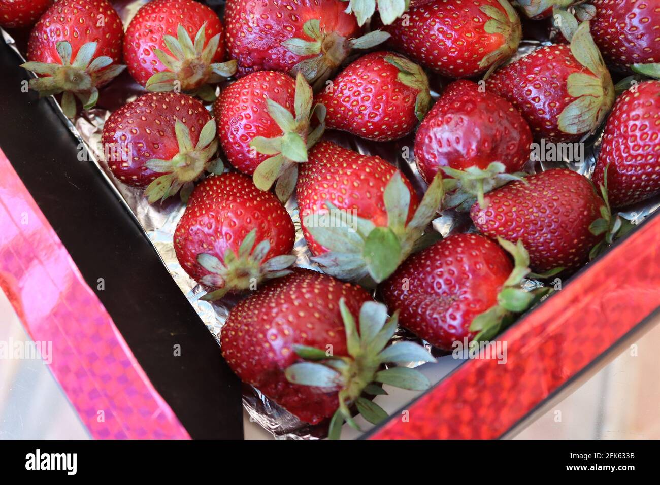 fun for fresh strawberry fruit with amazing view Stock Photo - Alamy