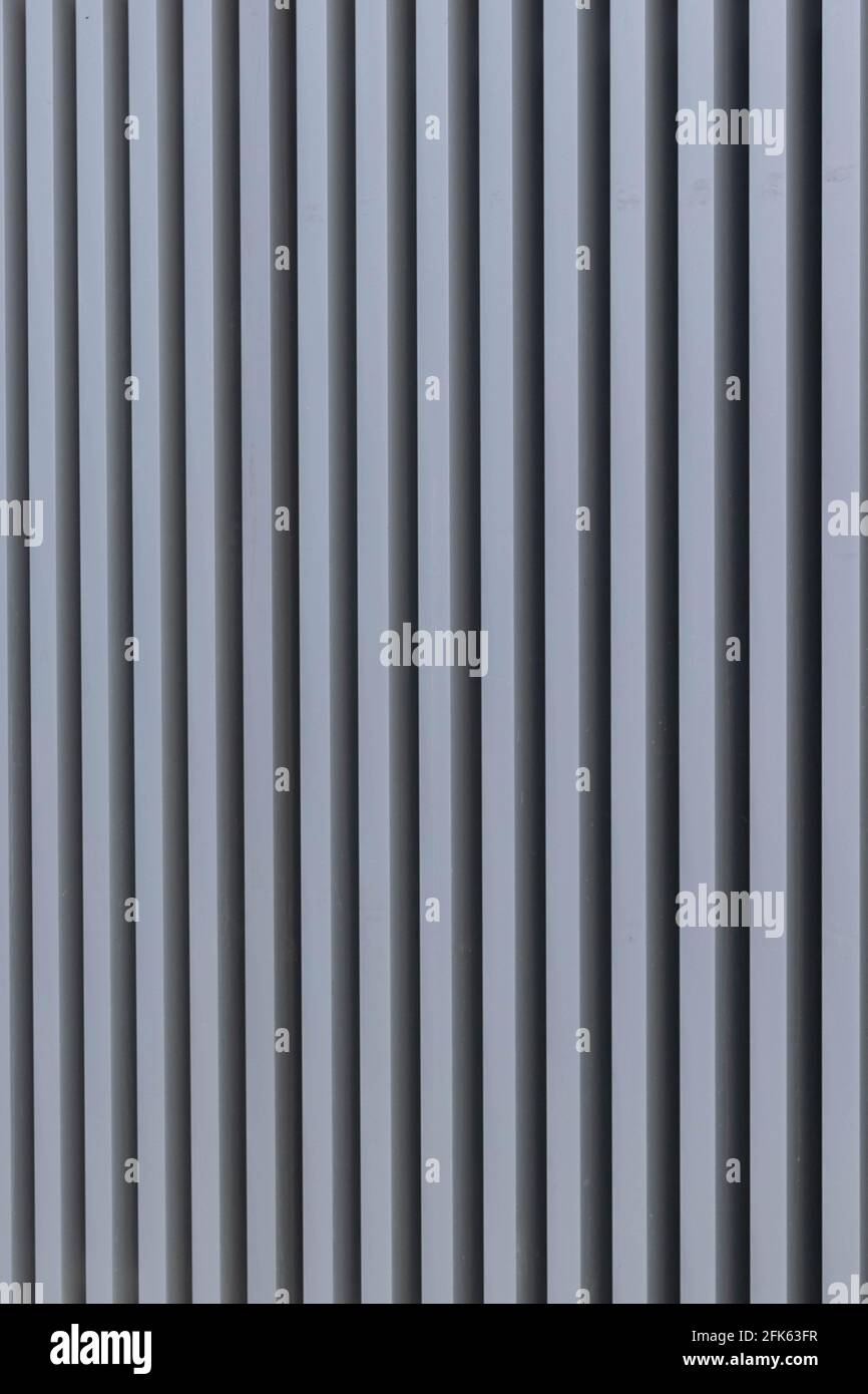 iron structure with straight metal bars forming a striped structure on ...