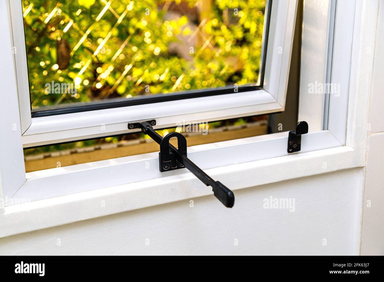 Aluminum outward opening top-hung window of a kitchen. Frame of white ...