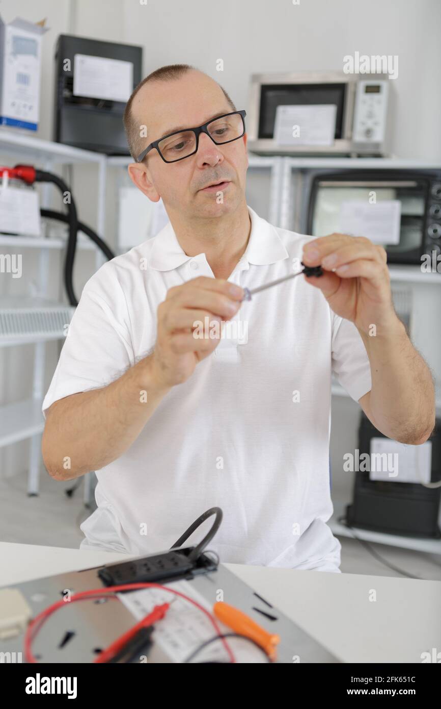 Fixing device hi-res stock photography and images - Alamy
