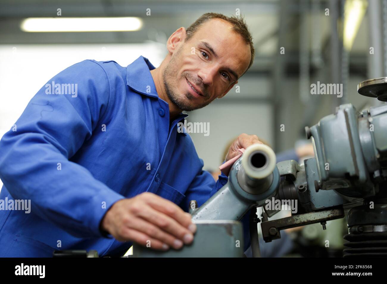 Asian machine operator in production hi-res stock photography and ...