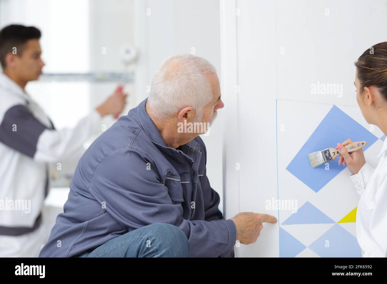 Teacher guiding hi-res stock photography and images - Alamy