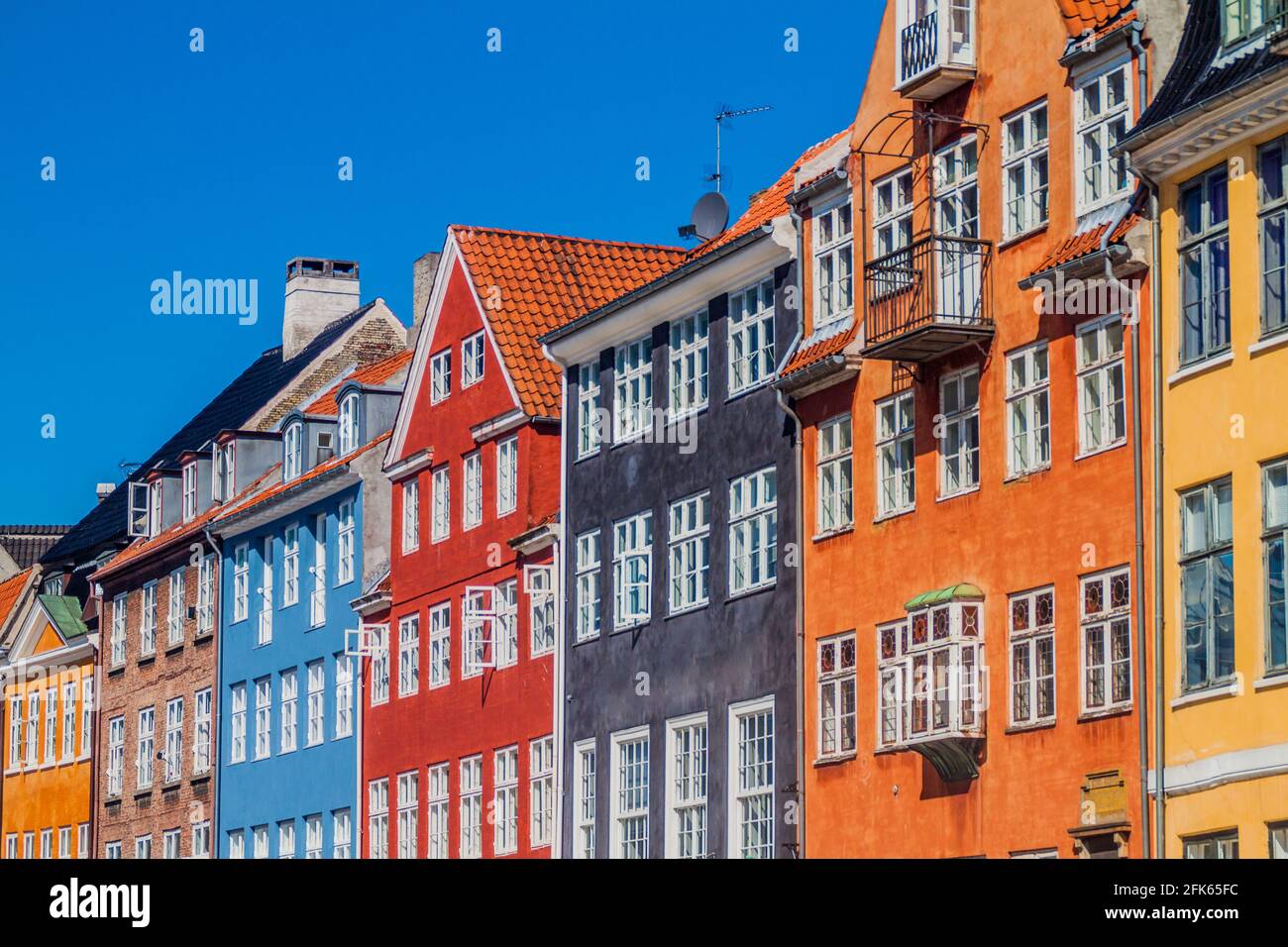 Colorful houses of Nyhavn district in Copenhagen, Denmark Stock Photo ...