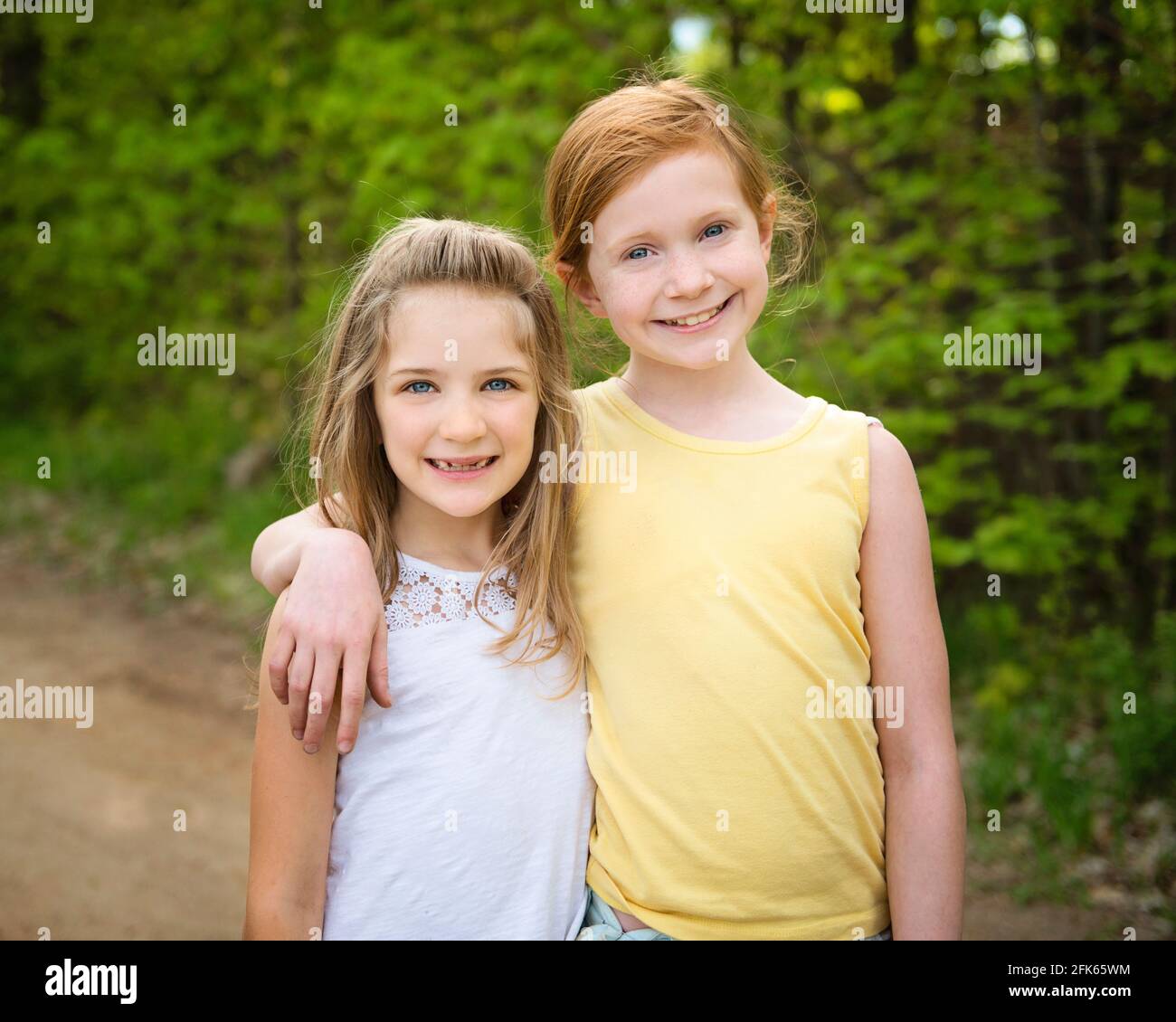 Two Young Girls Exploring outside Stock Photo - Alamy
