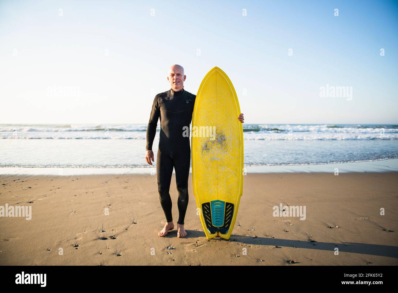 Strong male surfer hi-res stock photography and images - Alamy