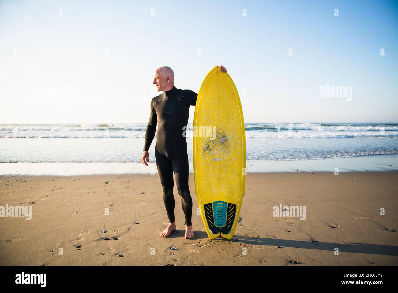 Strong male surfer hi-res stock photography and images - Alamy