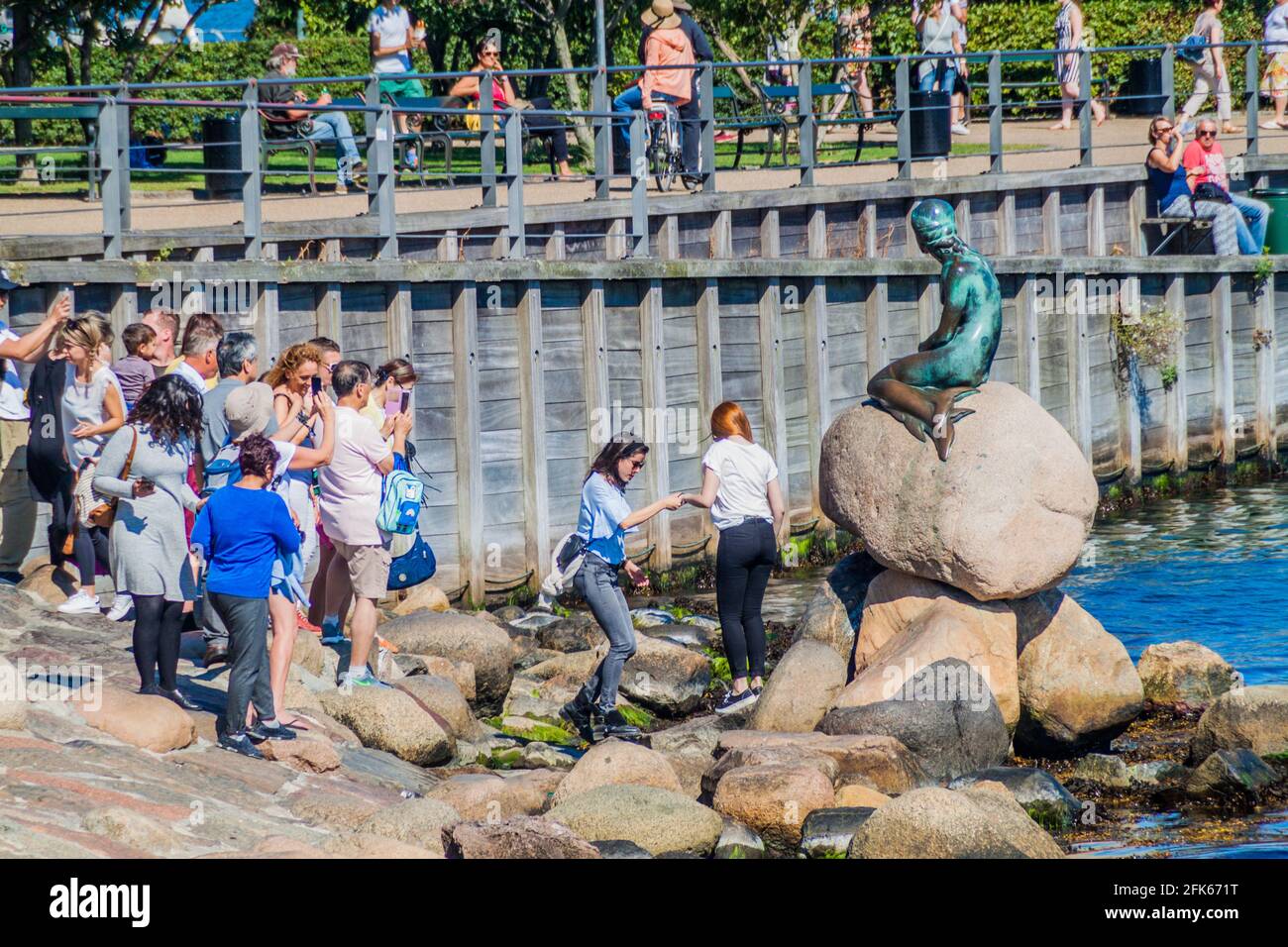 COPENHAGEN, DENMARK - AUGUST 26, 2016: Little Mermaid statue surrounded ...