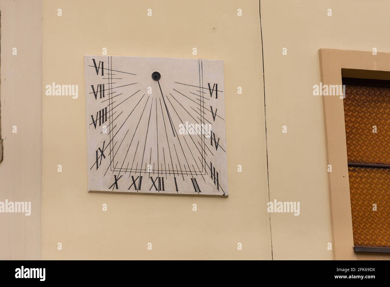 Street Square Clock. Interesting clock on the facade of a house in ...