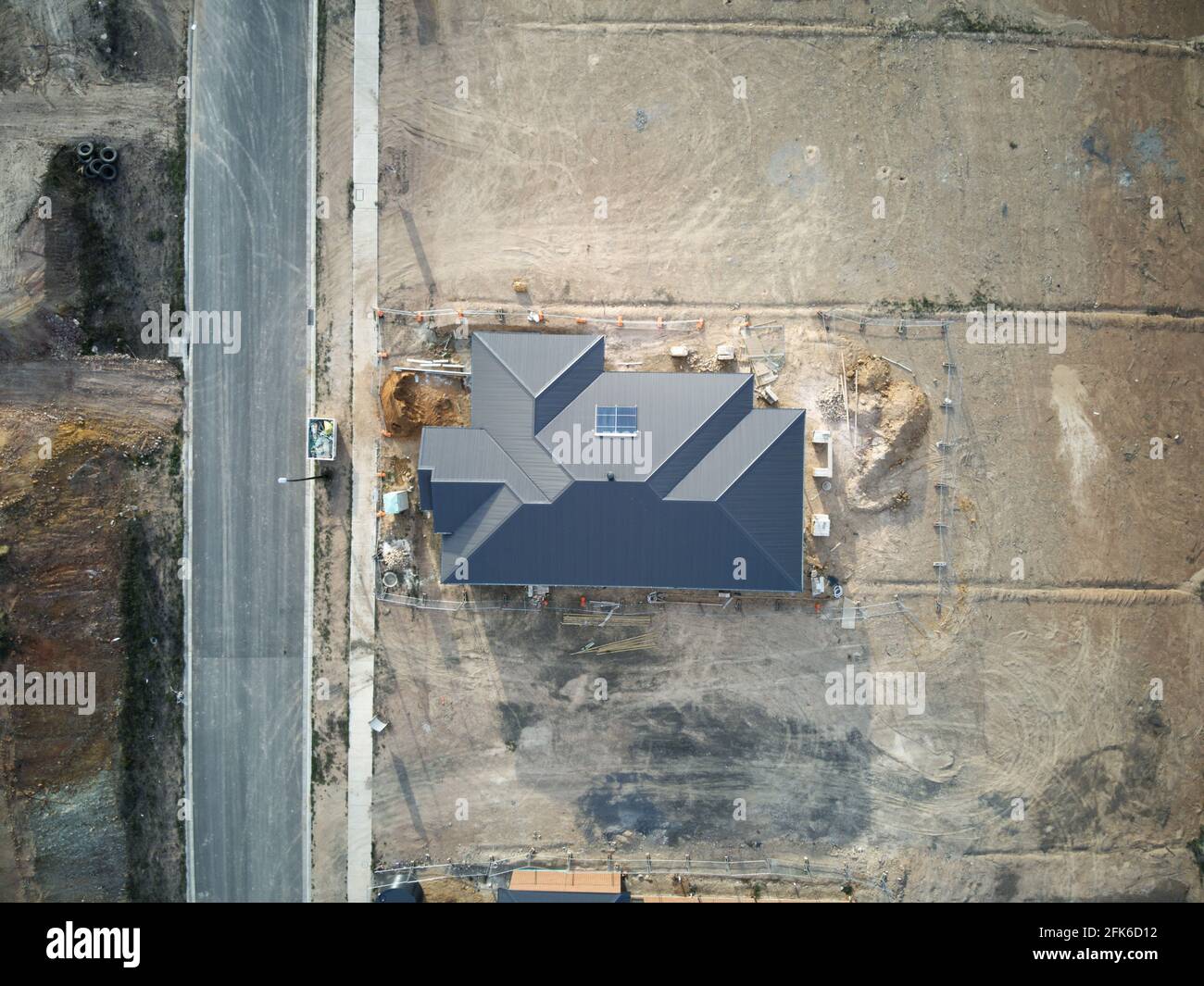 House under construction aerial view showing housing estate, near ...