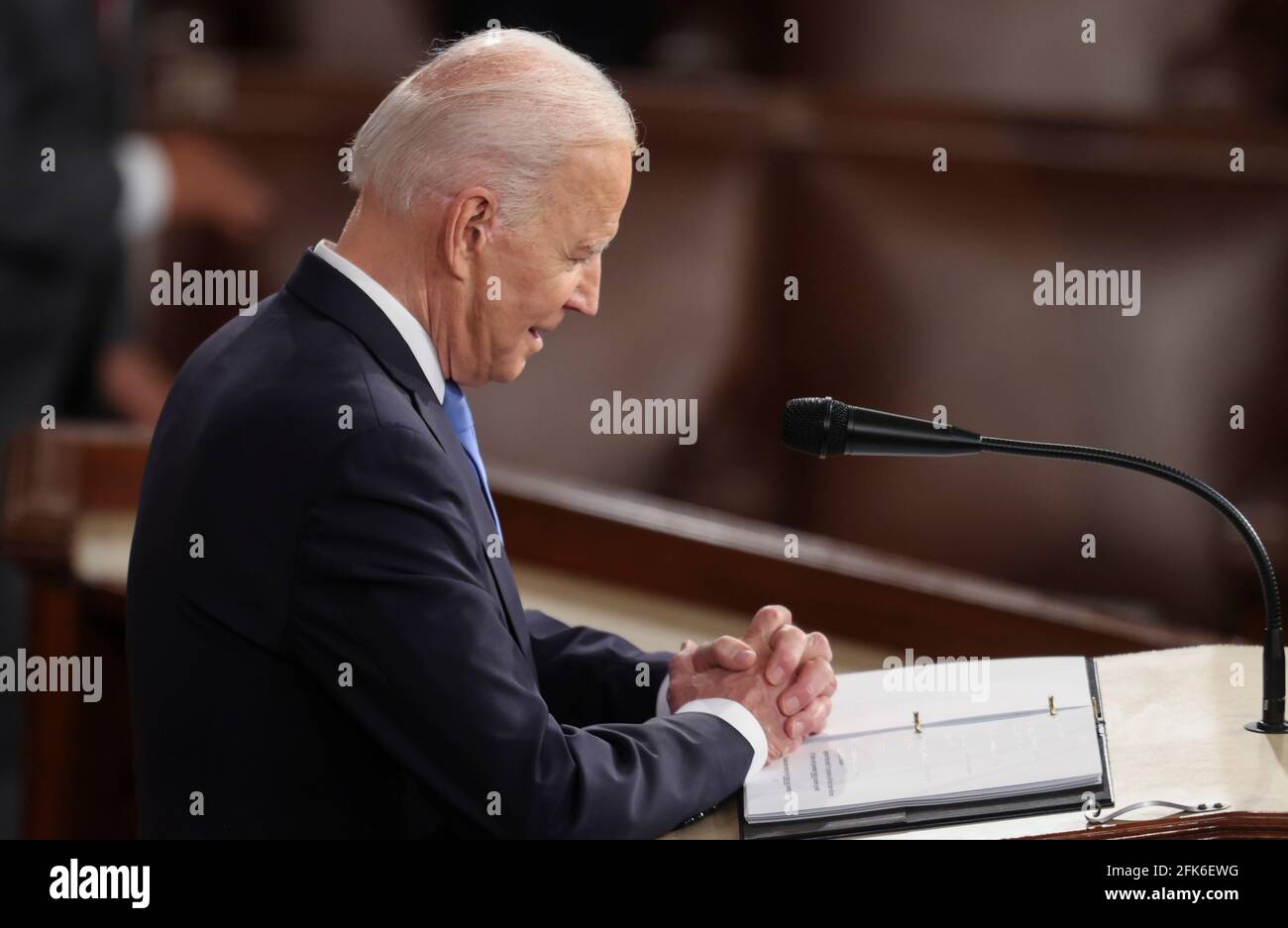 U.S. President Joe Biden delivers his first address to a socially ...