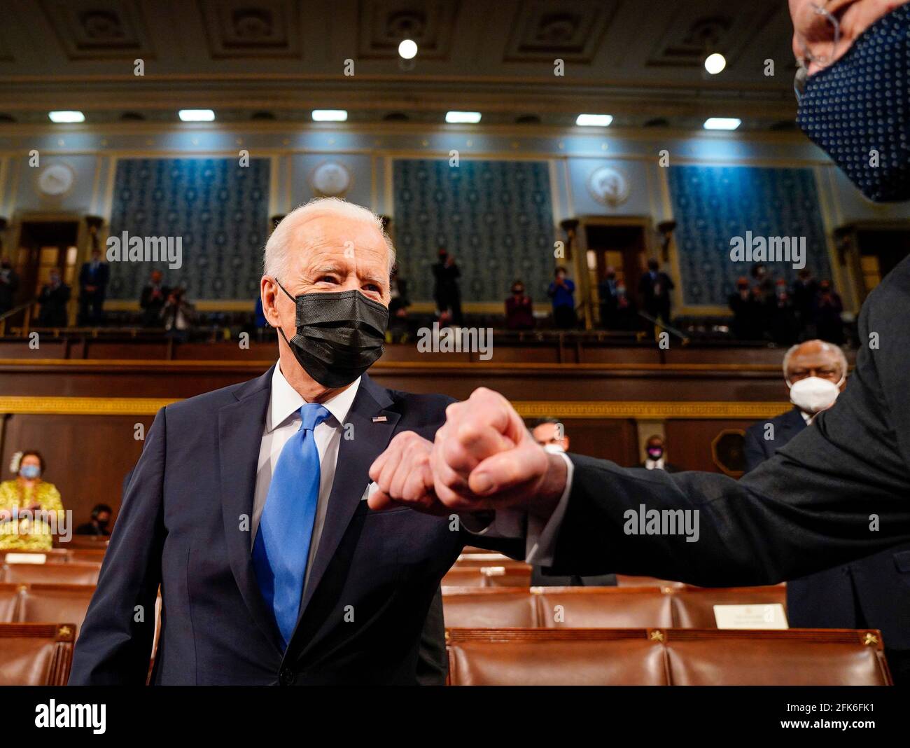 Washington, DC, USA. 28th Apr, 2021. President Joe Biden fist bumps Sen ...