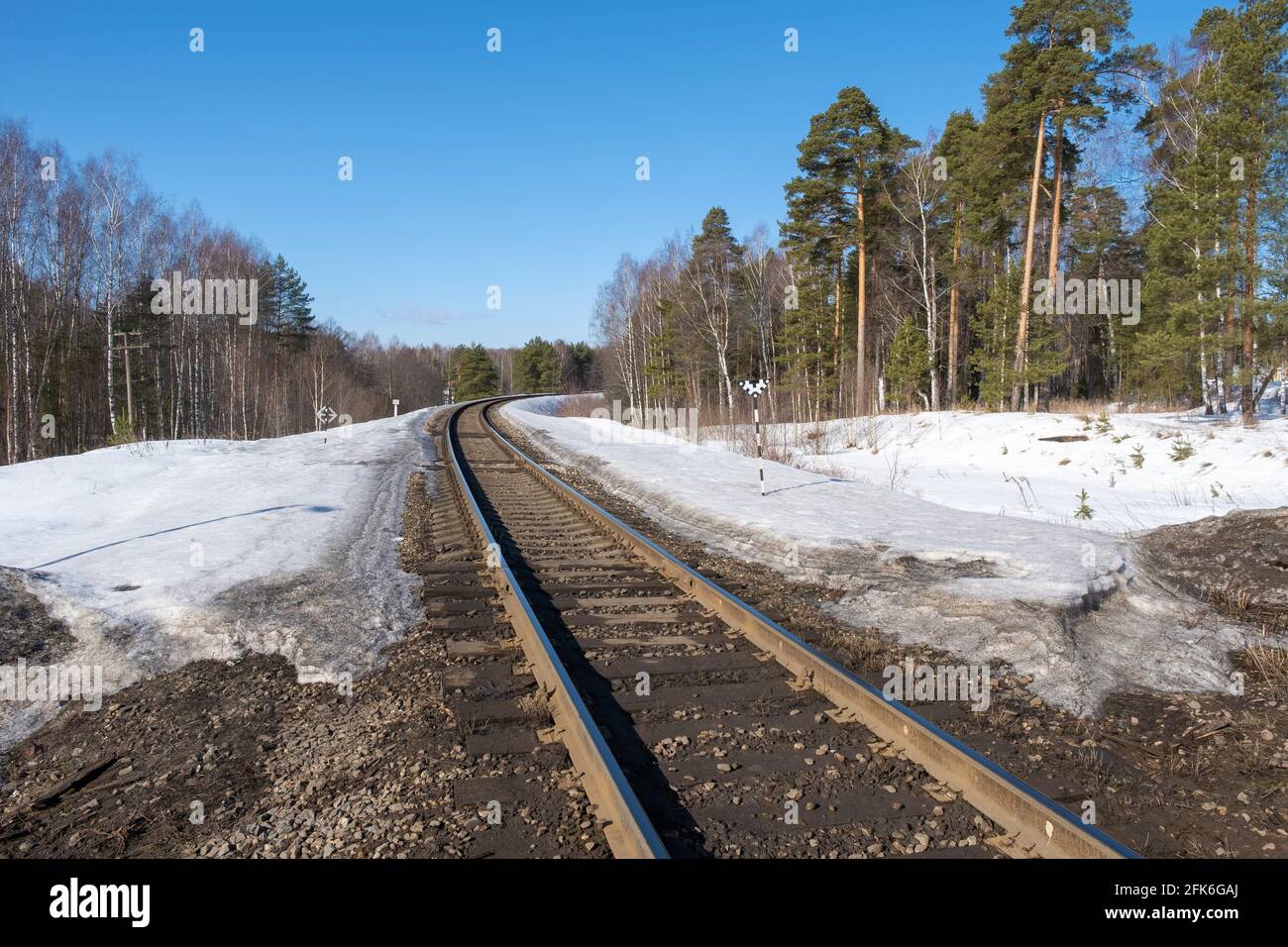 Shiny railway rails with sleepers and covered with pebbles, Russia ...