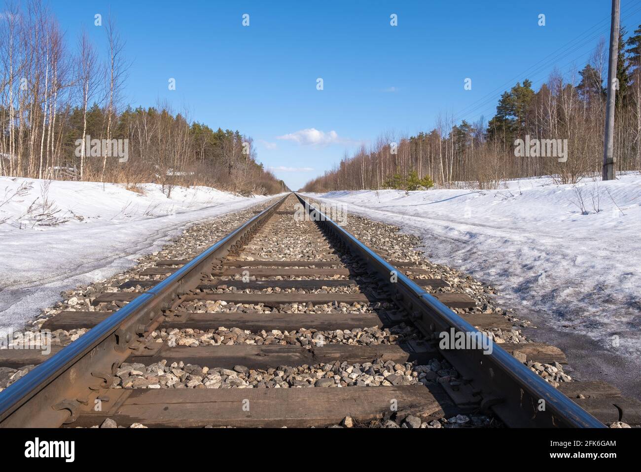 Shiny railway rails with sleepers and covered with pebbles, Russia ...