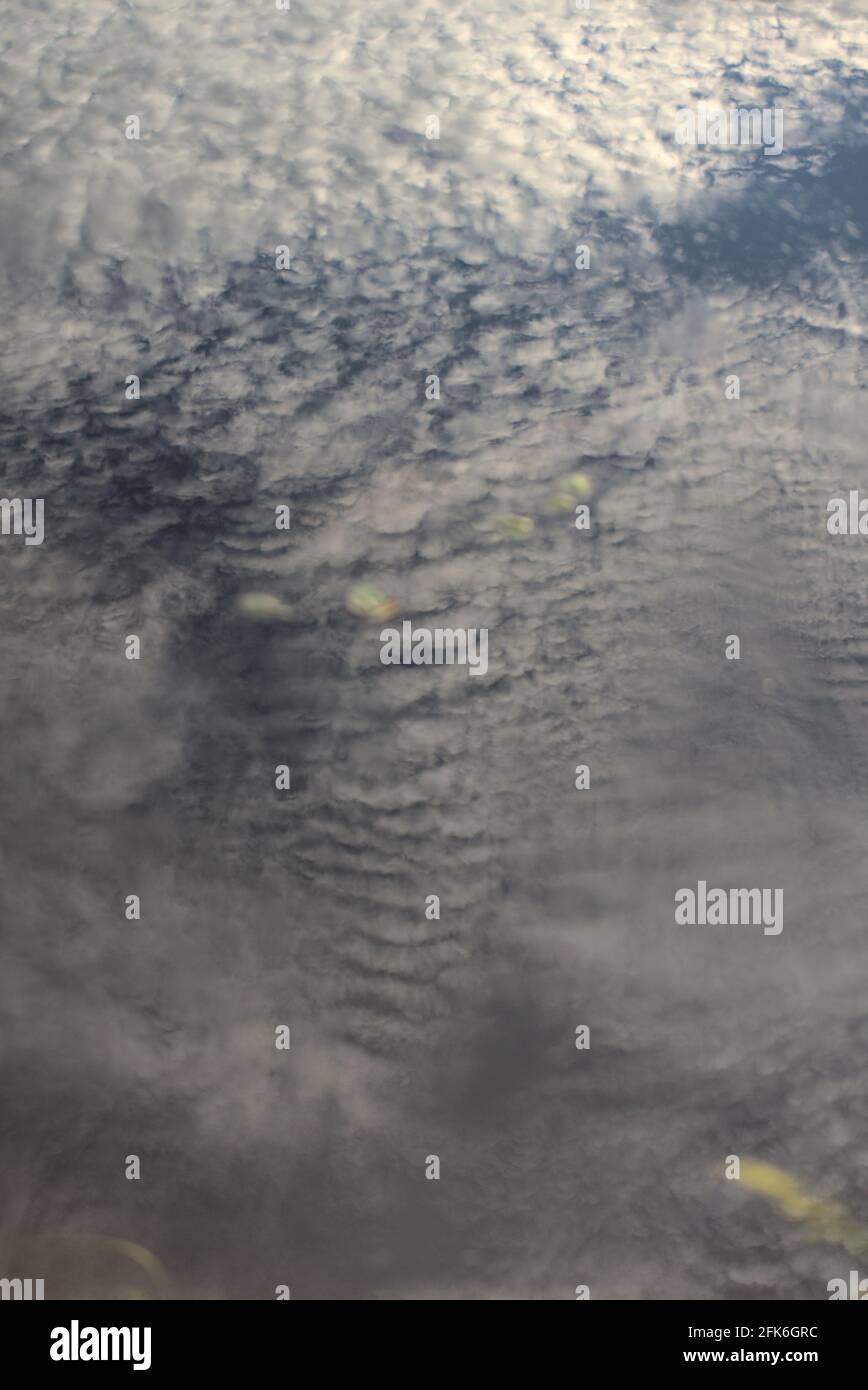 Clouds reflected on lake water hi-res stock photography and images - Alamy