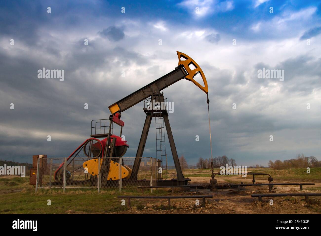 Oil drilling derricks at moutain oilfield for fossil fuels output and ...