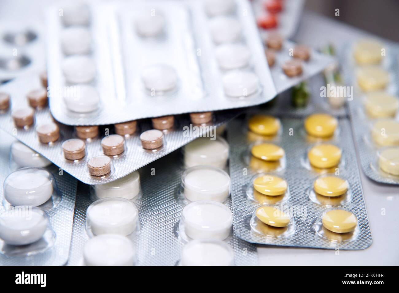 Overall view of pharmaceutical tablets and capsules in packages in ...