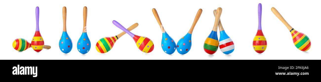Different maracas on white background Stock Photo - Alamy