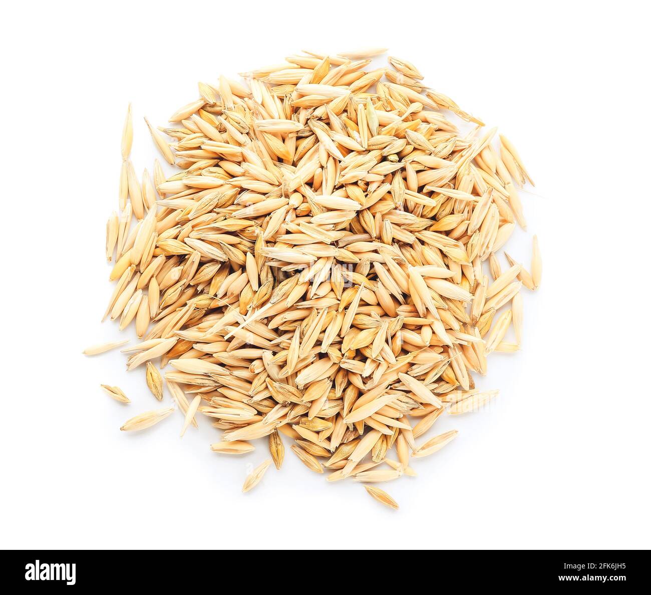 Heap of dry oats on white background Stock Photo - Alamy
