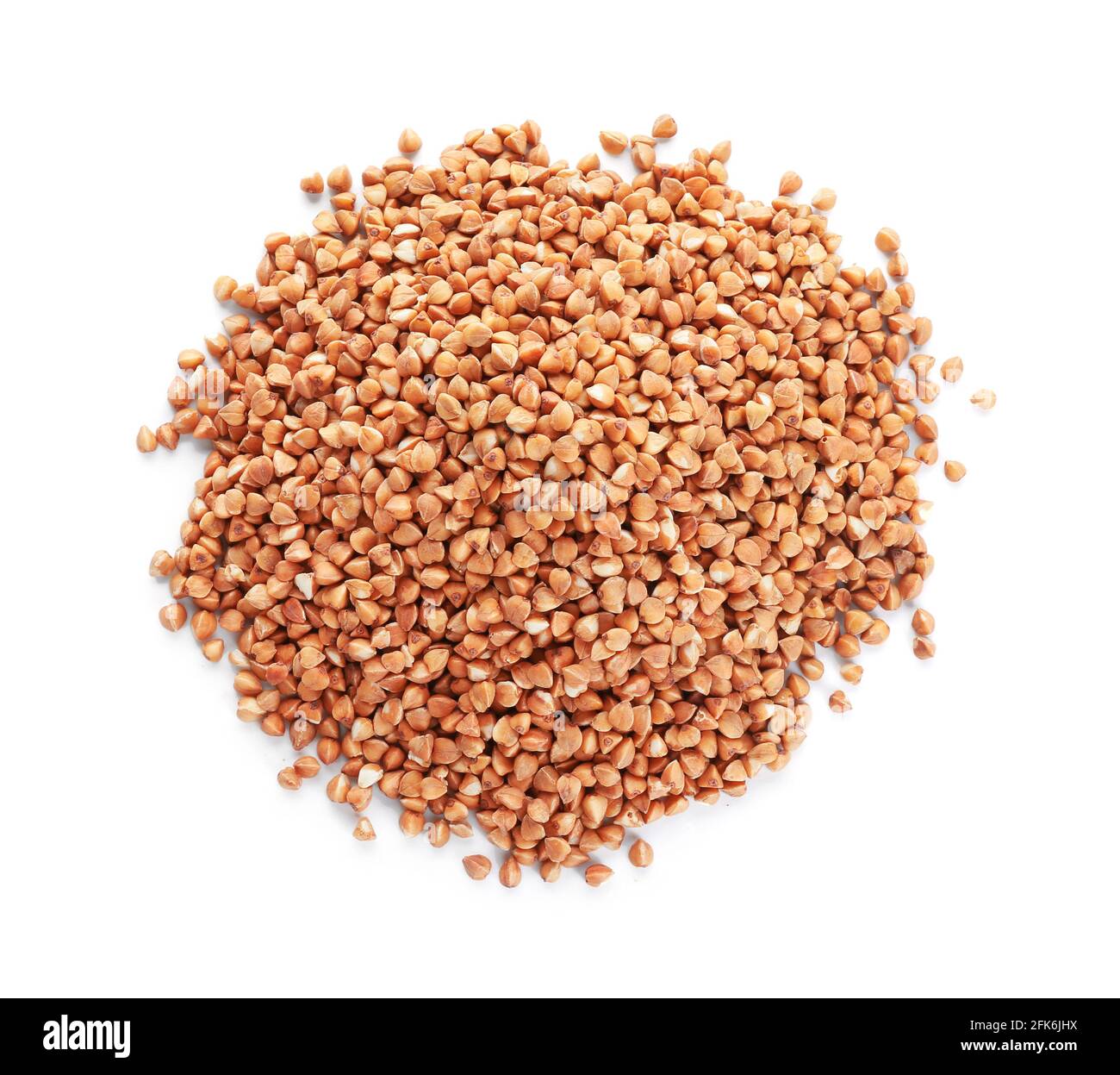 Heap of dry roasted buckwheat on white background Stock Photo - Alamy