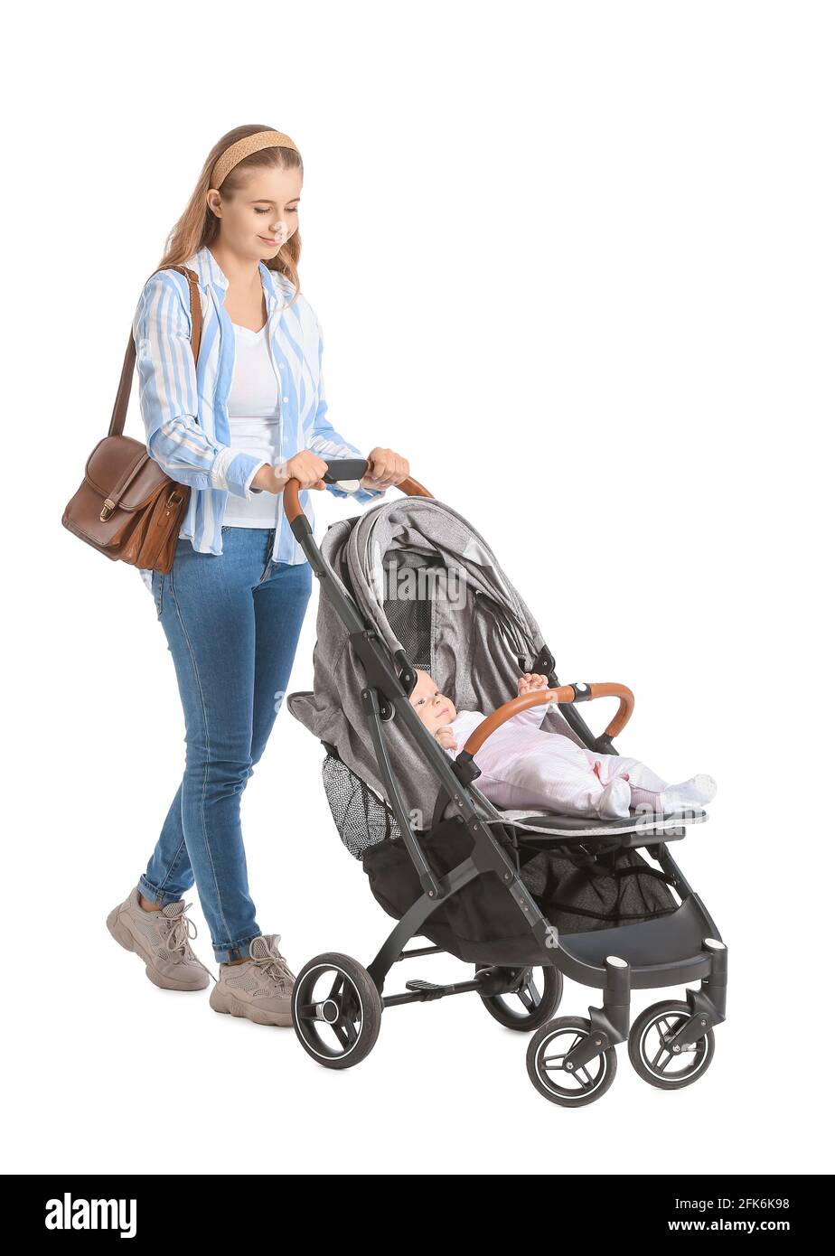 Woman and her cute baby in stroller on white background Stock Photo - Alamy