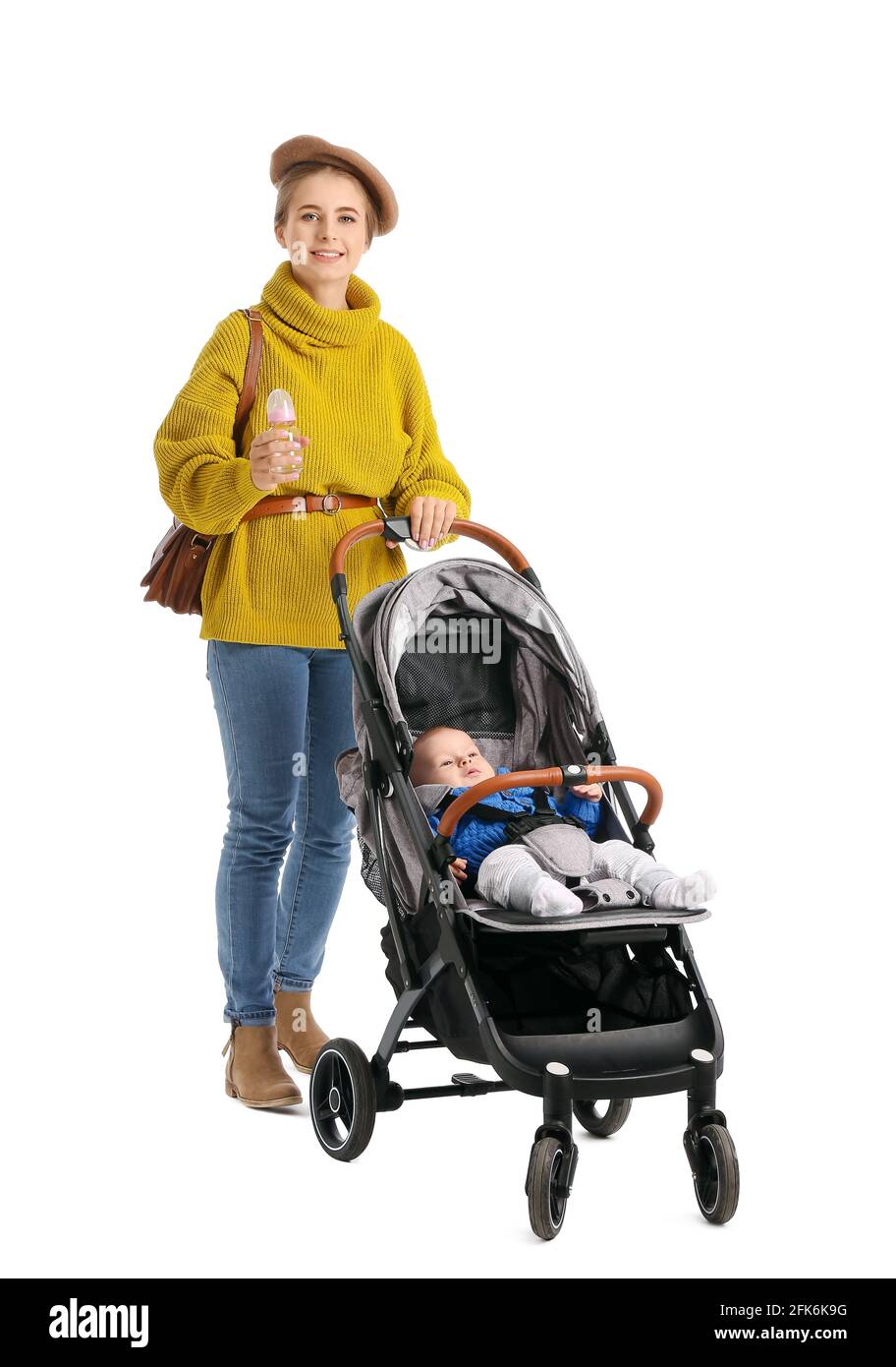 Woman and her cute baby in stroller on white background Stock Photo - Alamy