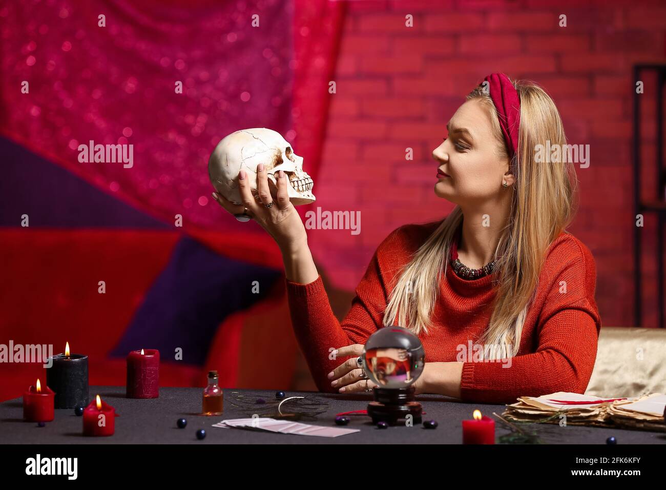 Fortune teller reading future at table Stock Photo - Alamy