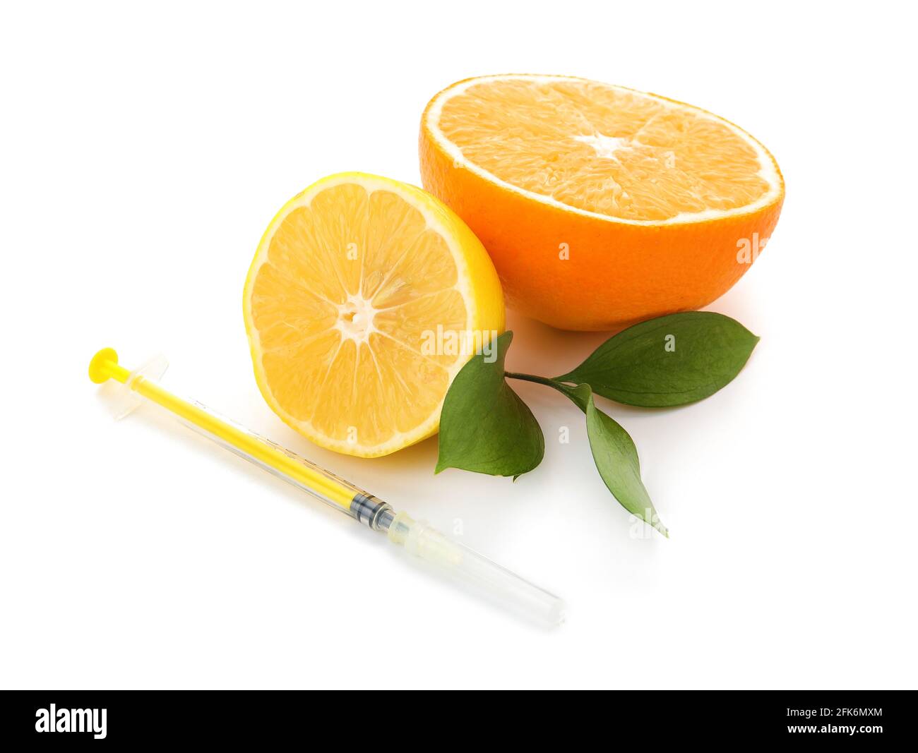 Syringe and ripe citrus fruits on white background Stock Photo - Alamy