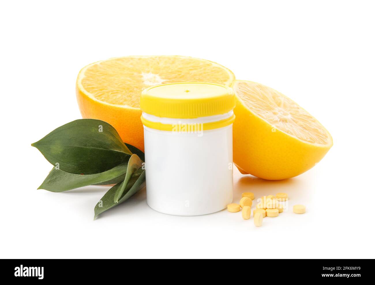Bottle with vitamin C pills and citrus fruits on white background Stock ...