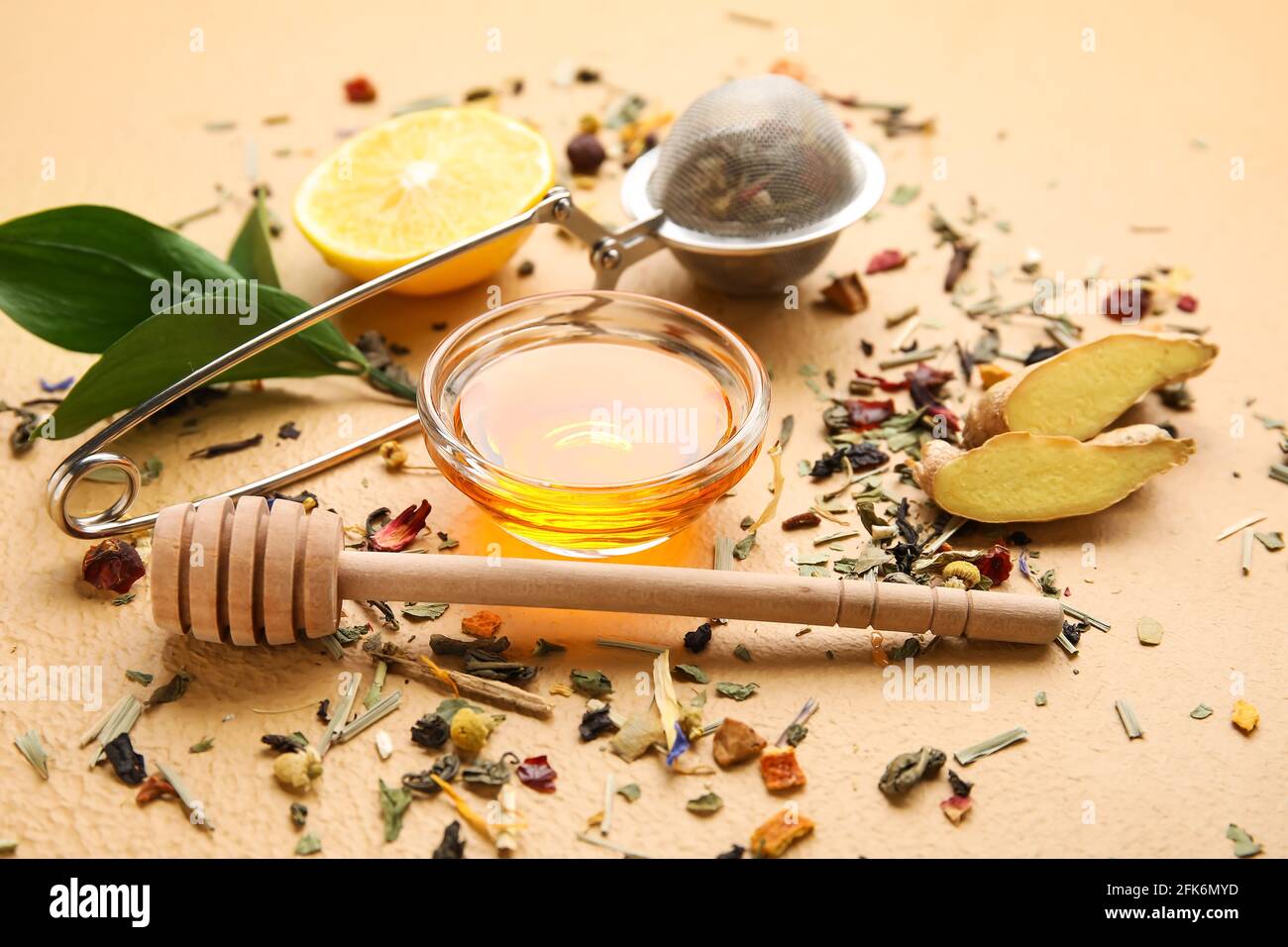 Composition with ingredients for tasty ginger tea on color background ...