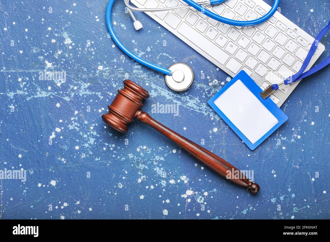 Judge gavel, PC keyboard and stethoscope on color background. Concept ...