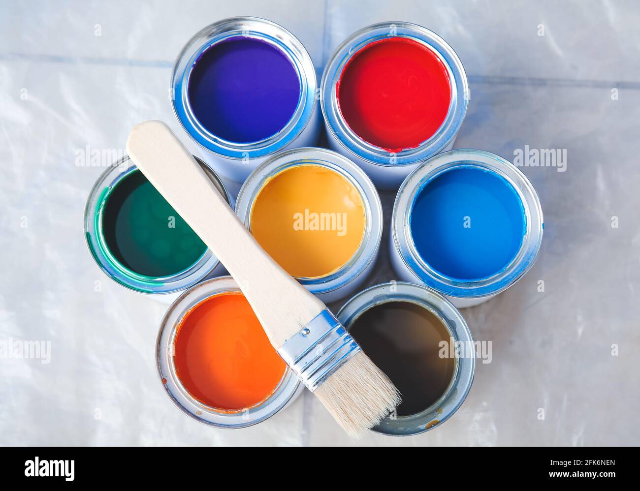 Composition with cans of paints, closeup Stock Photo - Alamy