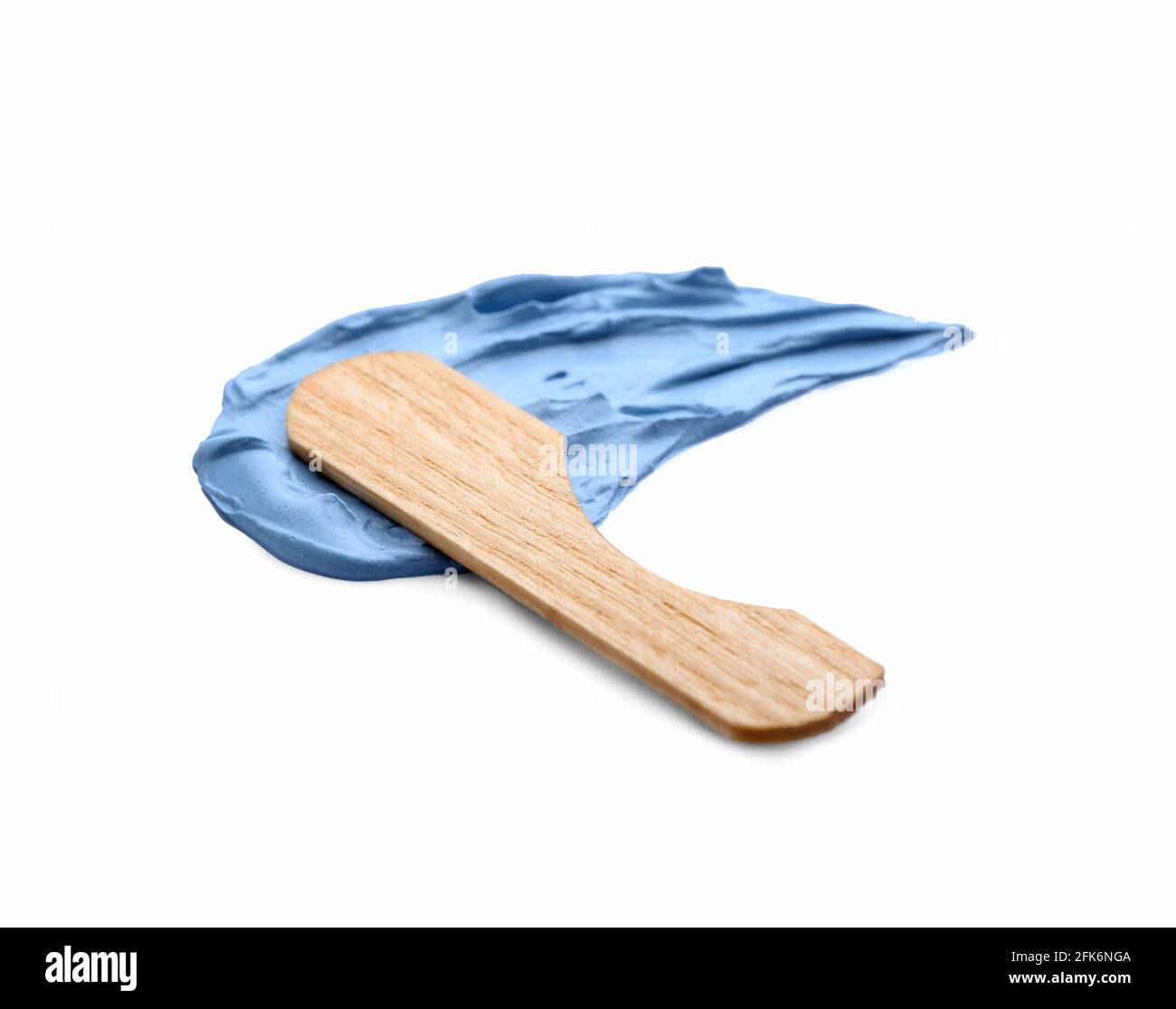 Sample of cosmetic clay and wooden spatula on white background Stock ...