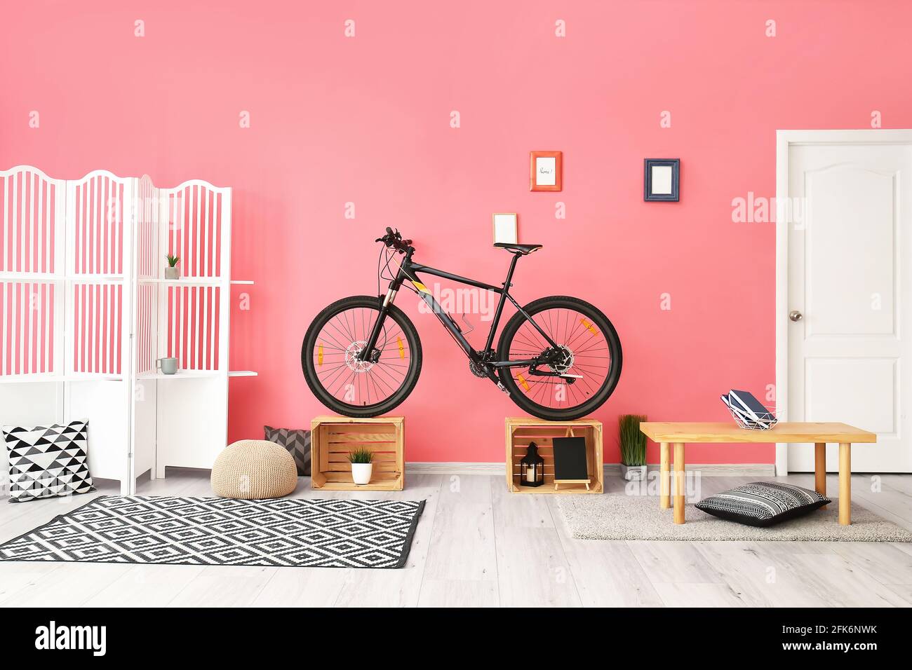 Interior of modern room with bicycle Stock Photo - Alamy