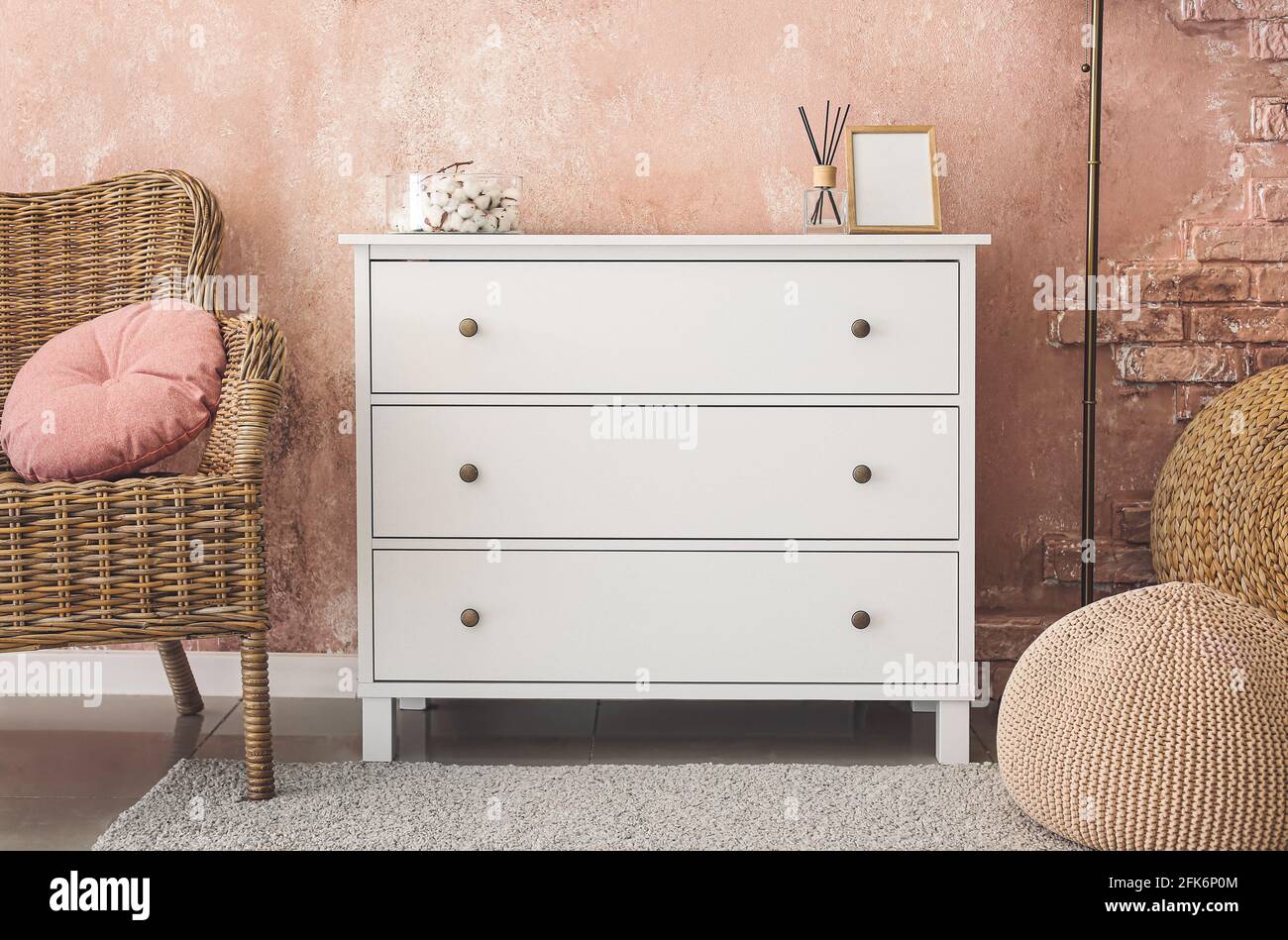 Interior of stylish living room with modern chest of drawers Stock ...