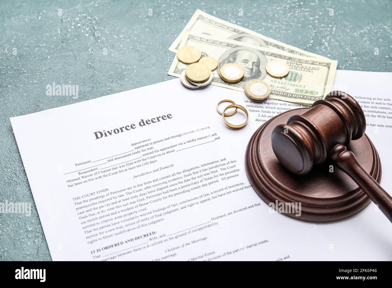 Judge's gavel, money and divorce decree on color background Stock Photo ...