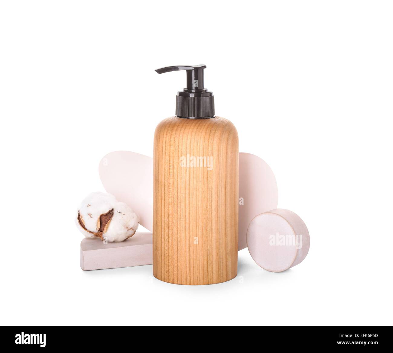 Composition with bottle of natural shampoo and cotton flower on white ...