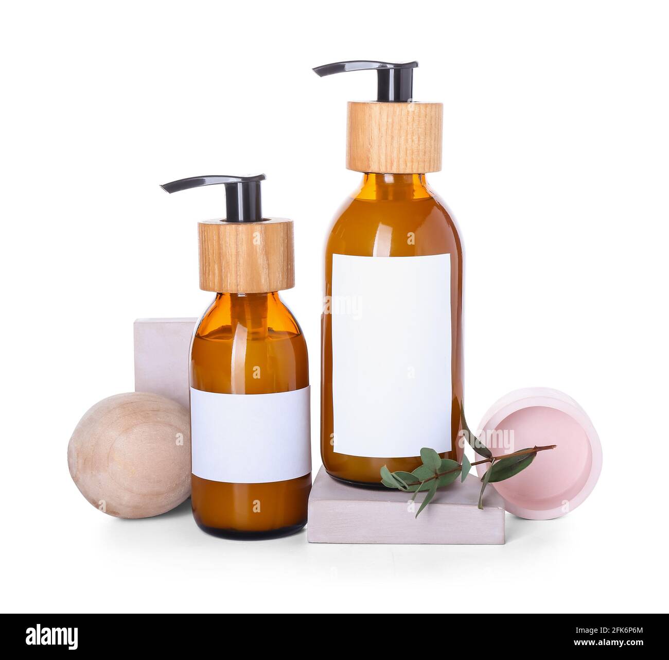 Composition with bottles of natural hair cosmetics on white background ...