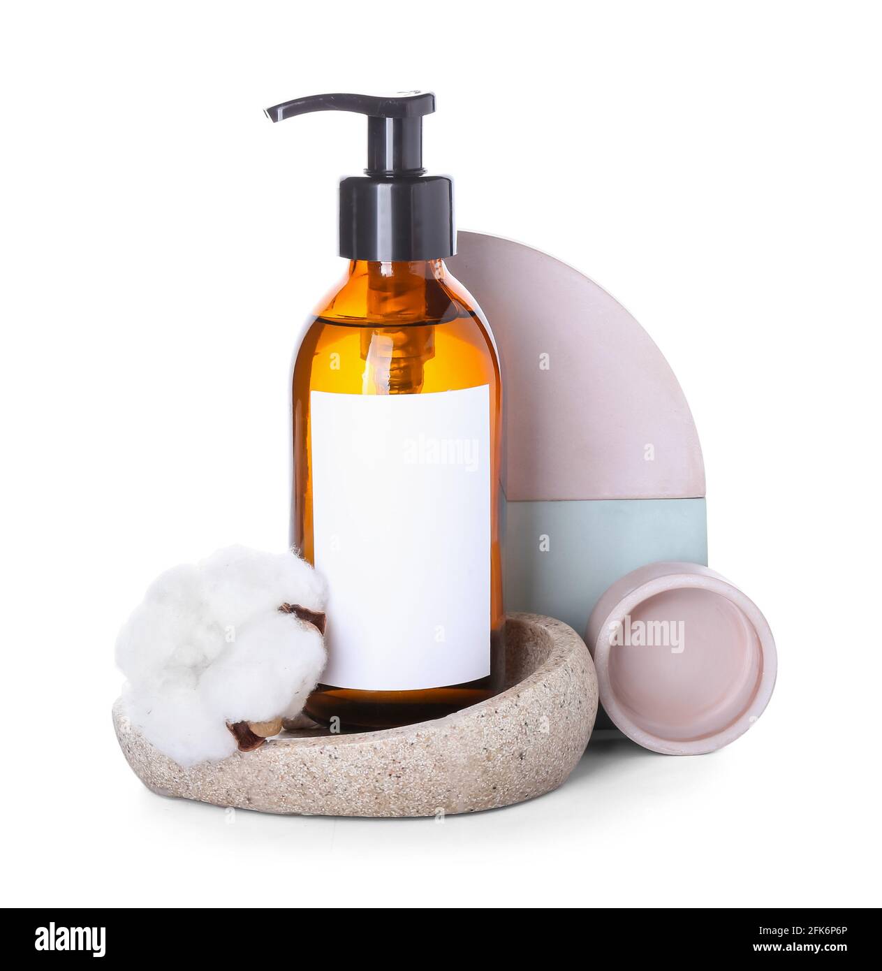 Composition with bottle of natural shampoo and cotton flower on white ...