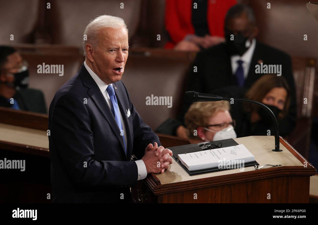 U.S. President Joe Biden delivers his first address to a joint session ...